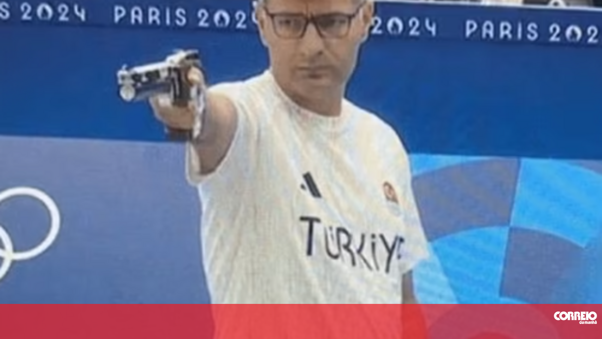 Esta fotografia de um atirador turco nos Jogos Olímpicos está a ...